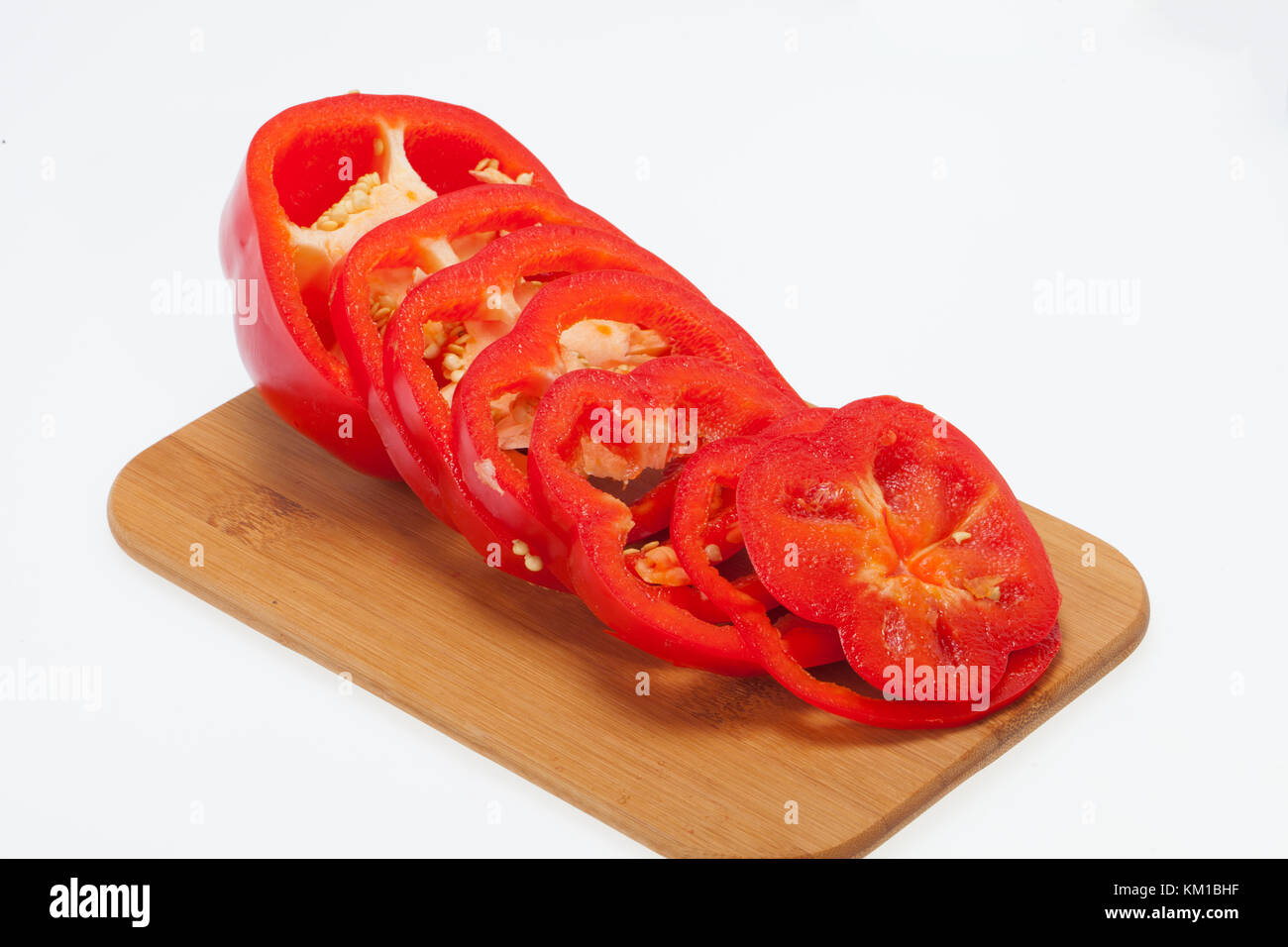 Sliced red pepper isolated on white background Stock Photo - Alamy