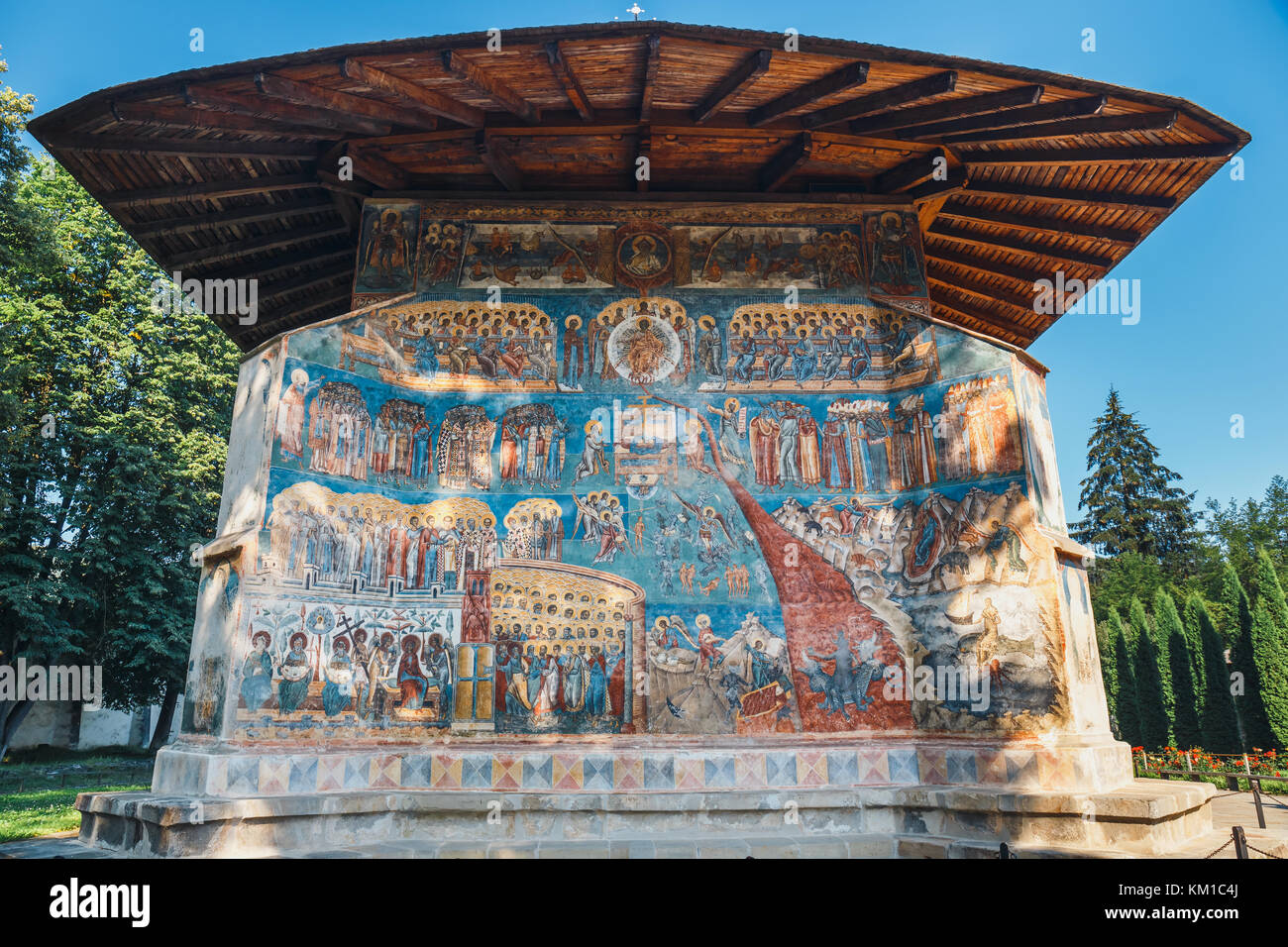 Orthodox church exterior with painted murals, painted church in Romania ...