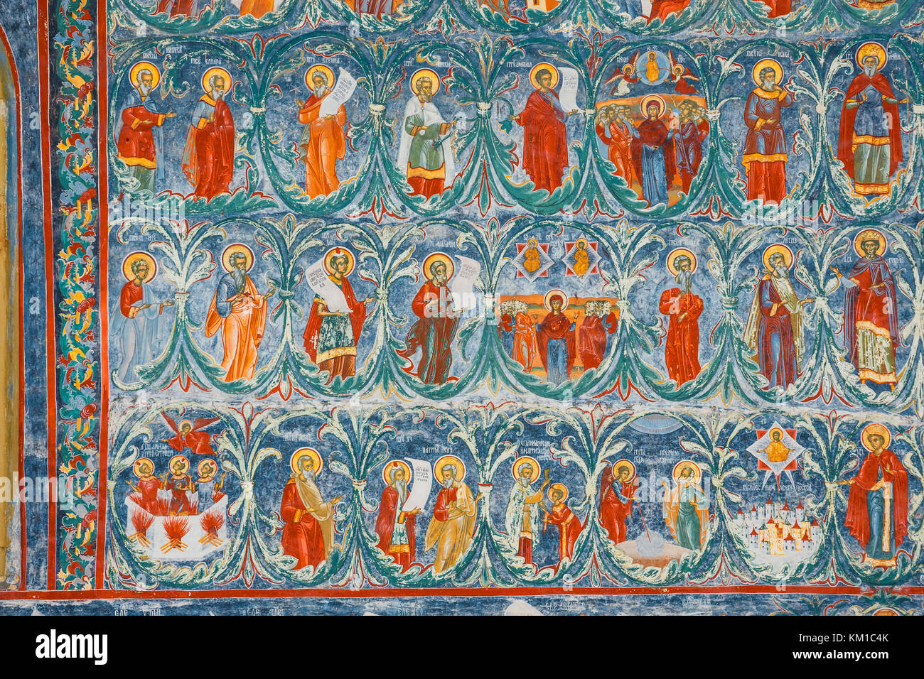 Orthodox church exterior with painted murals, painted church in Romania ...