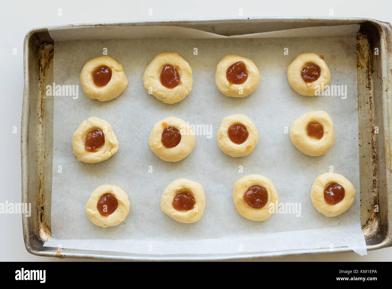Tray of biscuits / cookies about to go in oven Stock Photo - Alamy