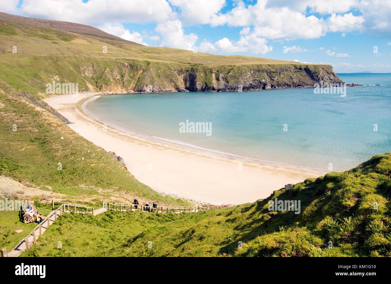 People climbing up path from Silver Strand beach at Malin Beg ...