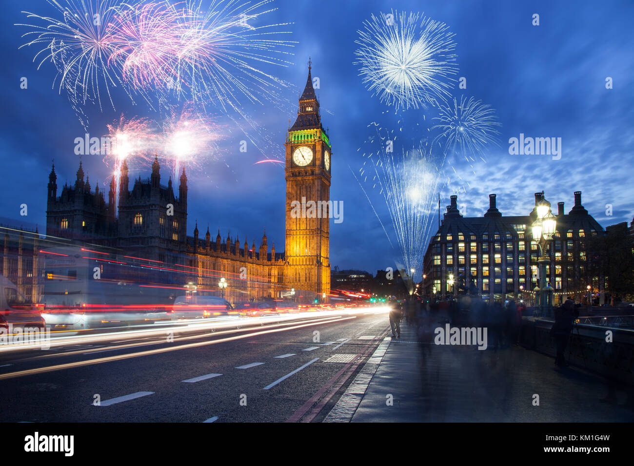 explosive fireworks display fills the sky around Big Ben. New Year's ...