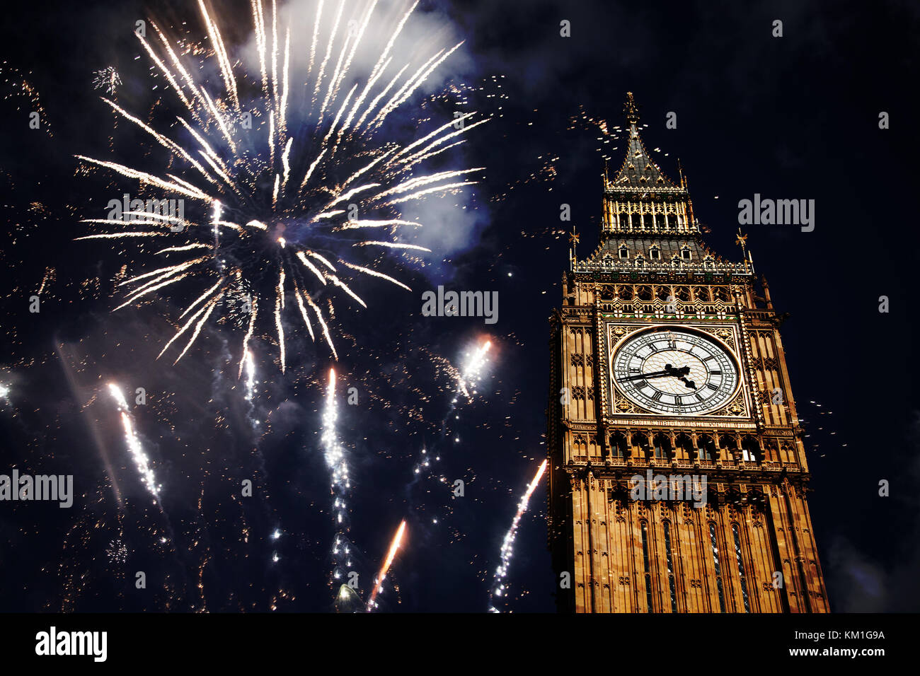 explosive fireworks display fills the sky around Big Ben. New Year's ...