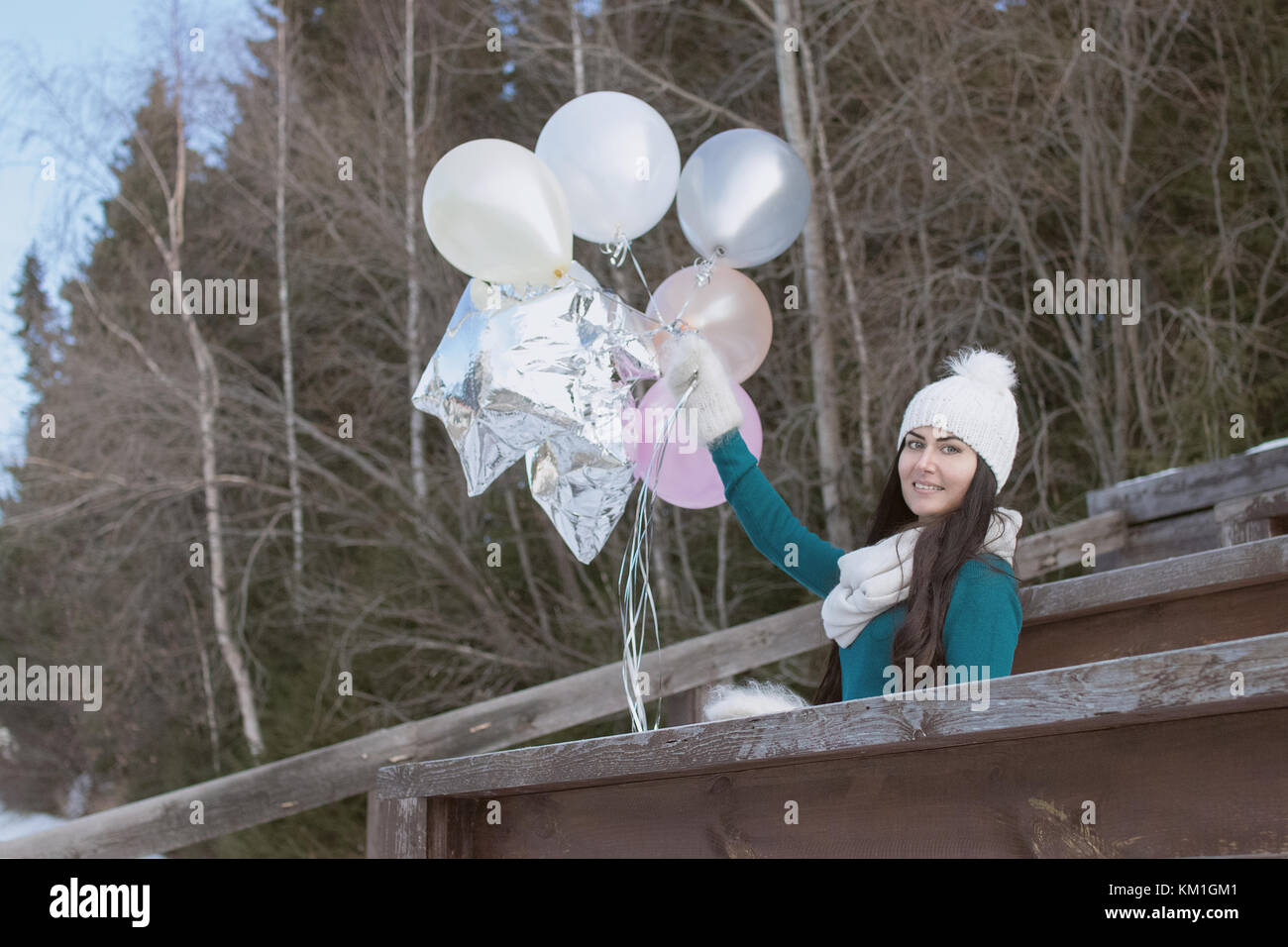 Girl flying balloons in sky hi-res stock photography and images - Alamy