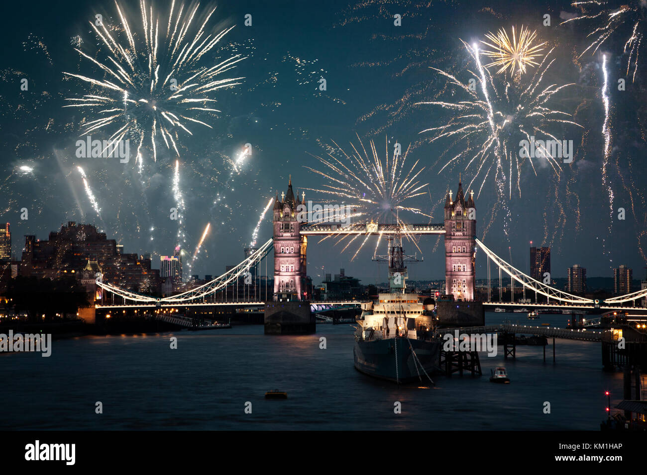 tower bridge with fireworks, celebration of the New Year in London, UK ...