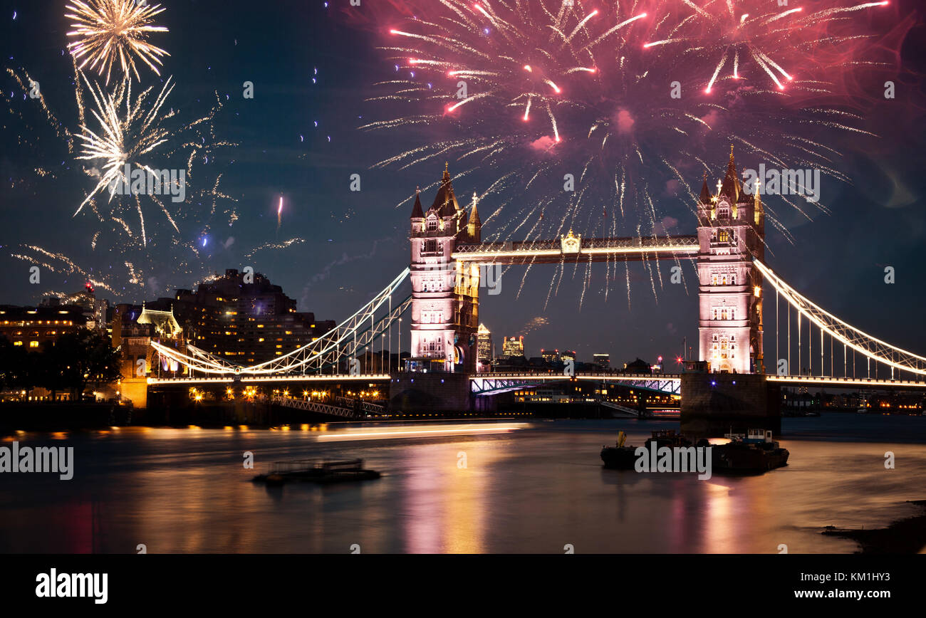 tower bridge with fireworks, celebration of the New Year in London, UK ...