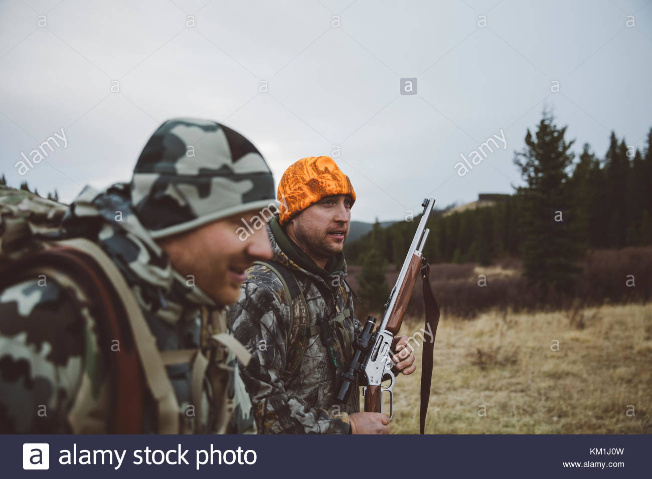 Man carrying gun hi-res stock photography and images - Alamy