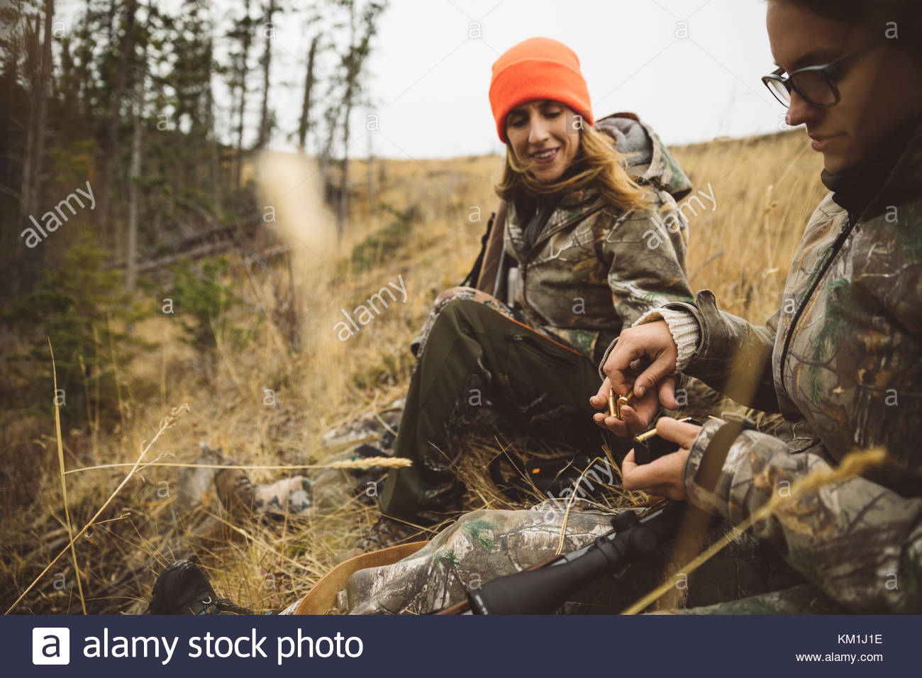 Woman loading a shotgun hi-res stock photography and images - Alamy