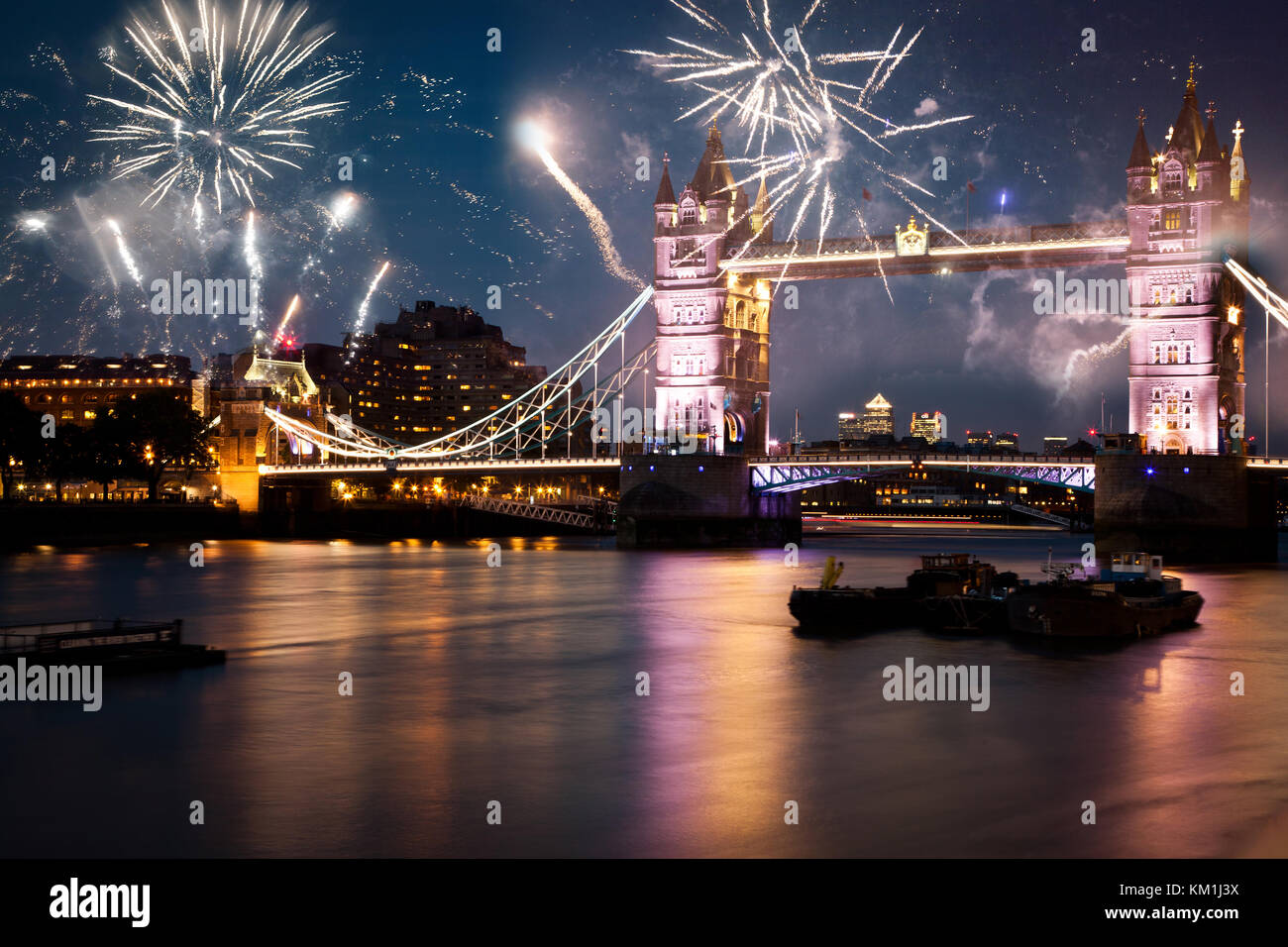 tower bridge with fireworks, celebration of the New Year in London, UK ...