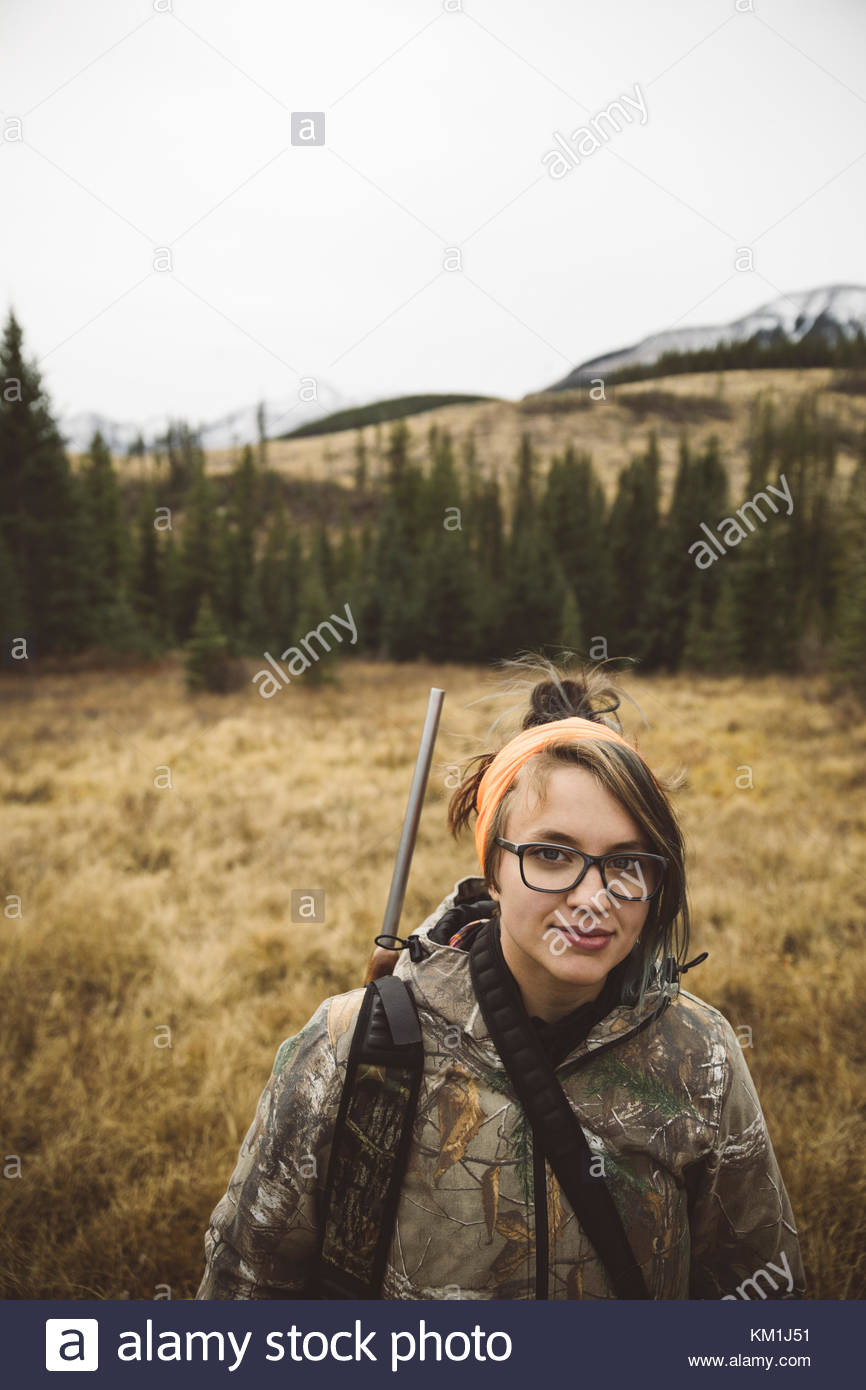 Young woman with hunting rifle hi-res stock photography and images - Alamy