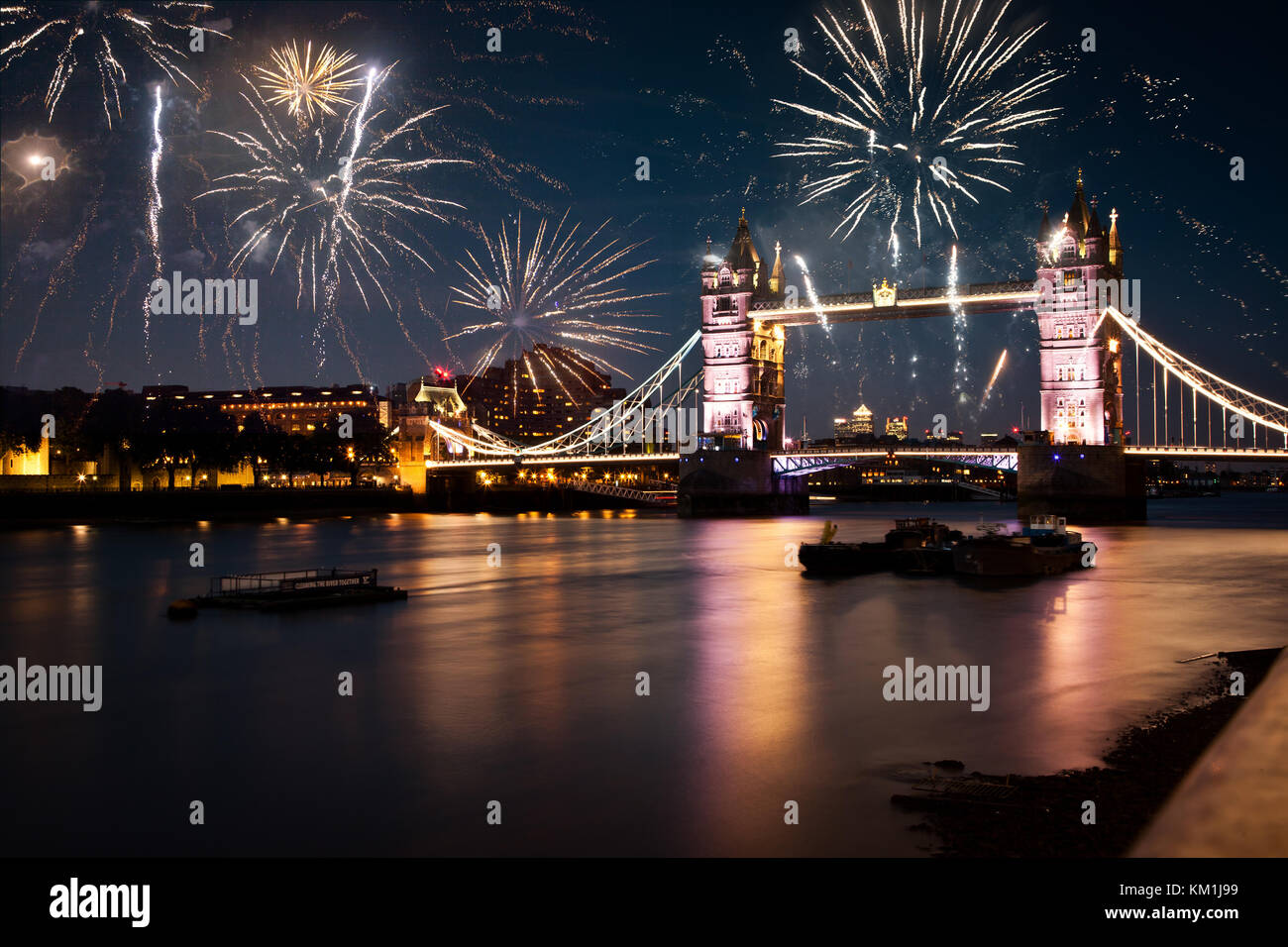 tower bridge with fireworks, celebration of the New Year in London, UK ...