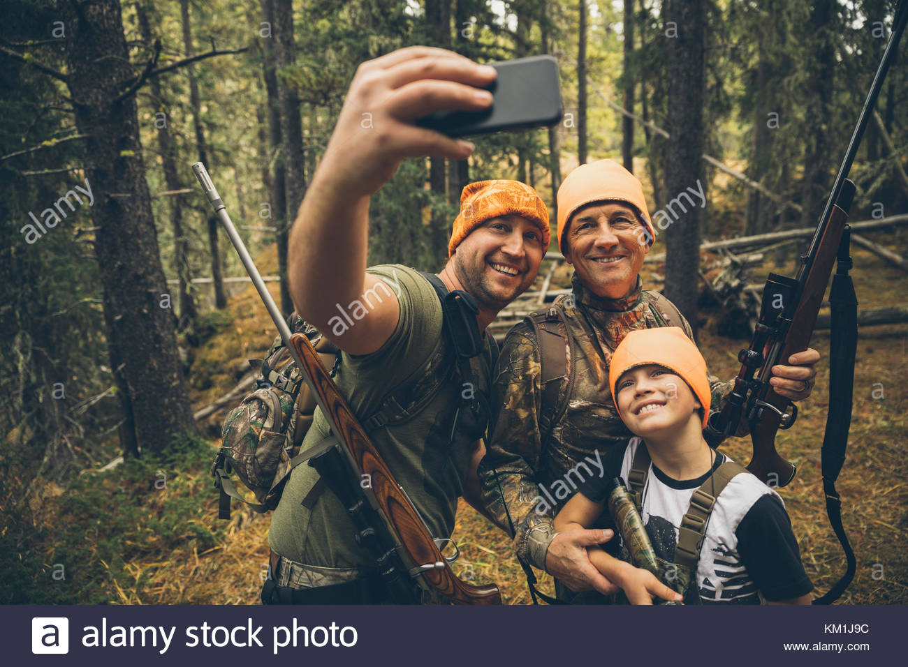 Male taking photo of child hi-res stock photography and images - Alamy