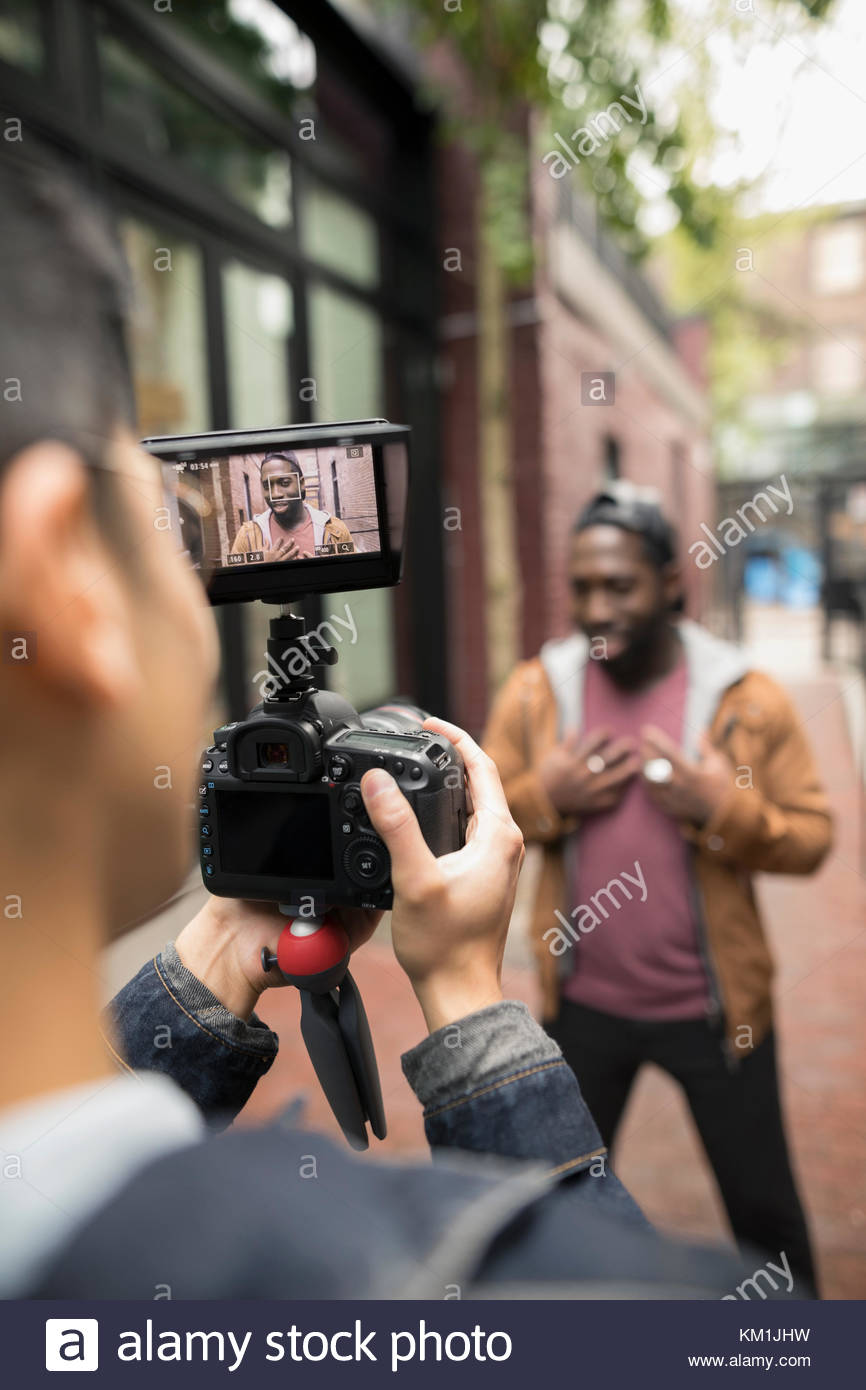 Videoing on street hi-res stock photography and images - Alamy