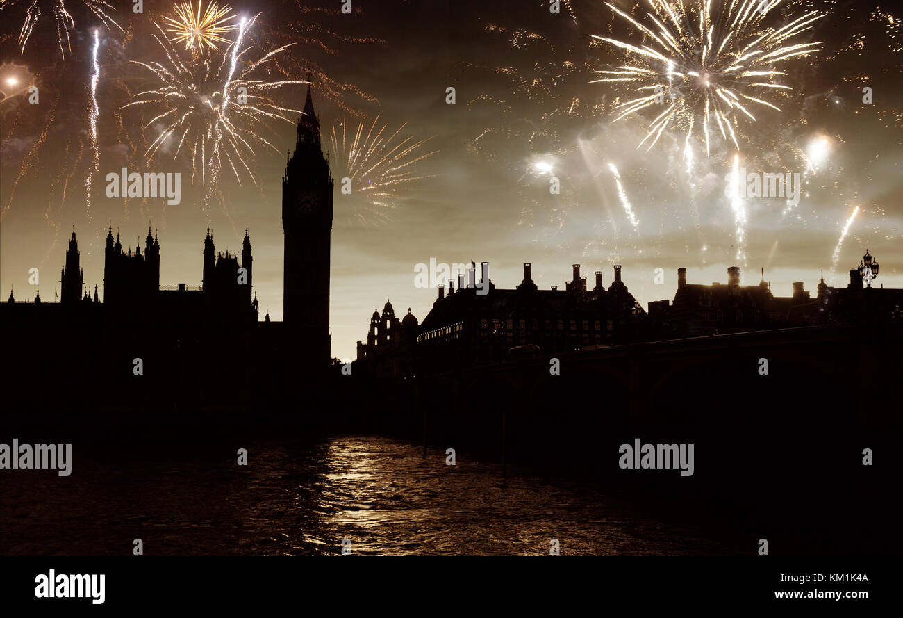 explosive fireworks display fills the sky around Big Ben. New Year's ...