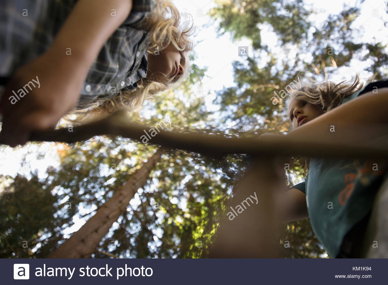 Girl with stick hi-res stock photography and images - Alamy