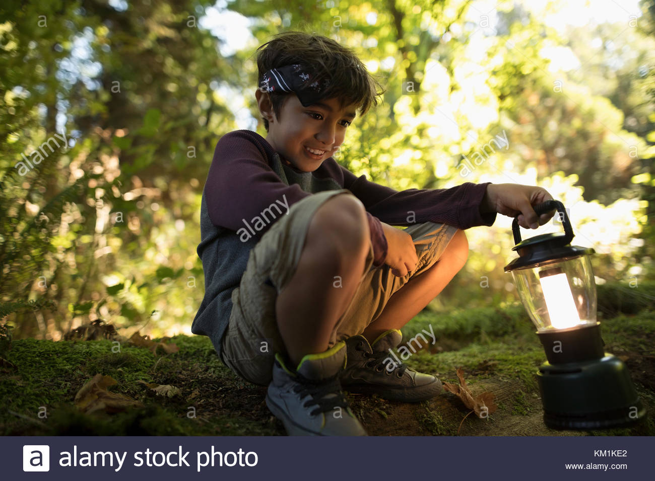 Boy exploring forest hi-res stock photography and images - Alamy
