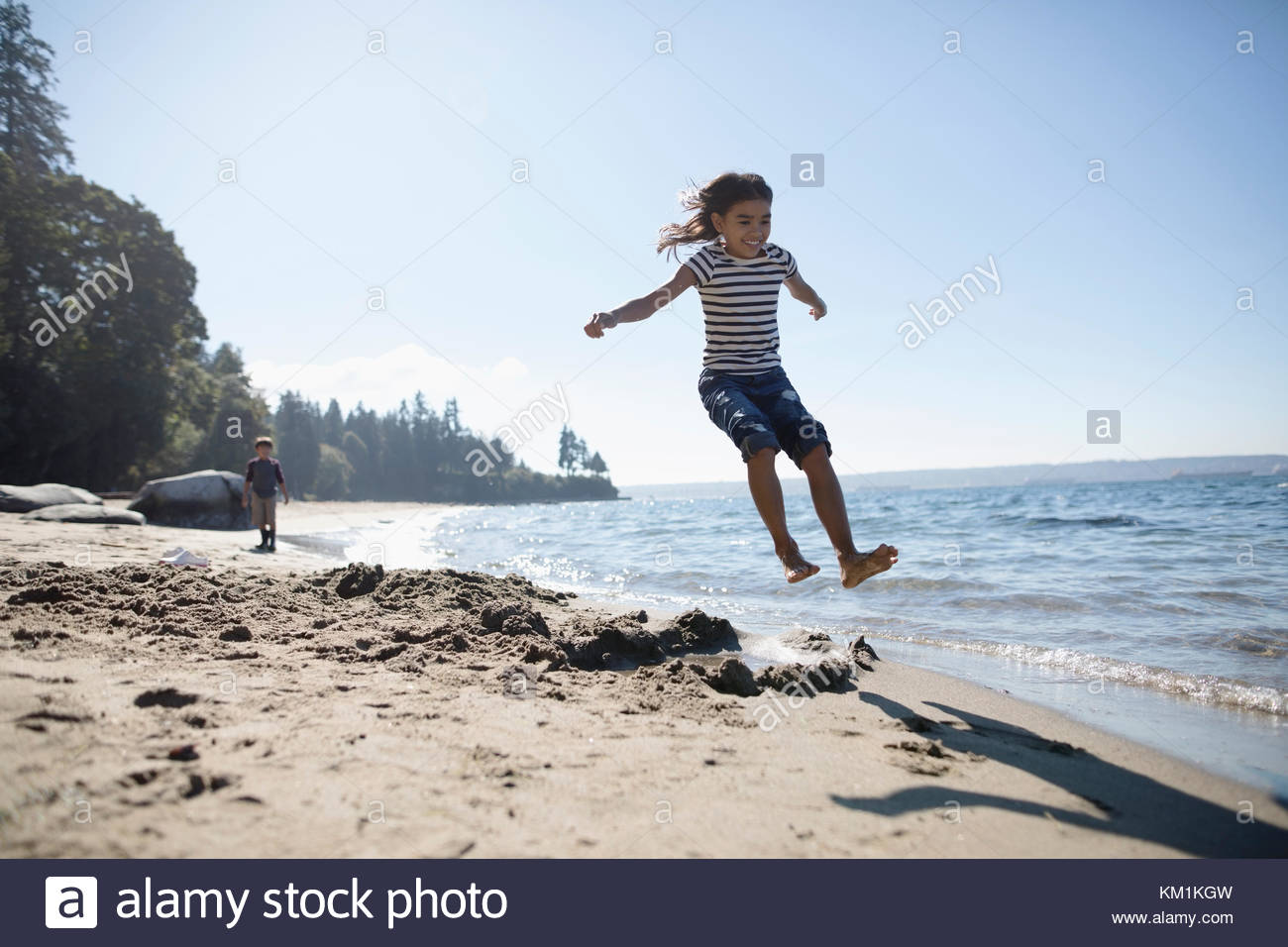 Girl jumping water hi-res stock photography and images - Alamy