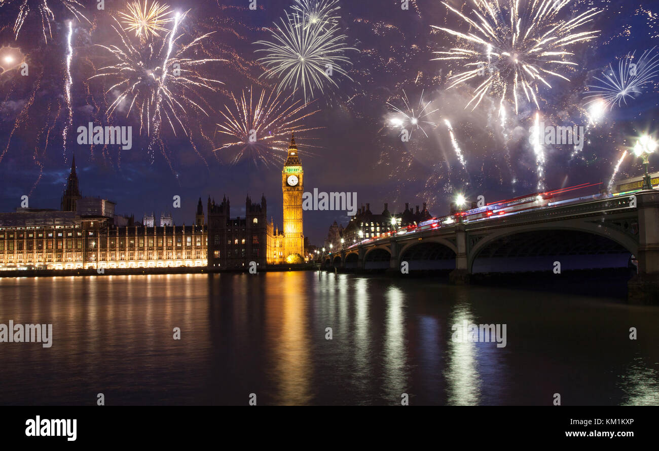 explosive fireworks display fills the sky around Big Ben. New Year's ...