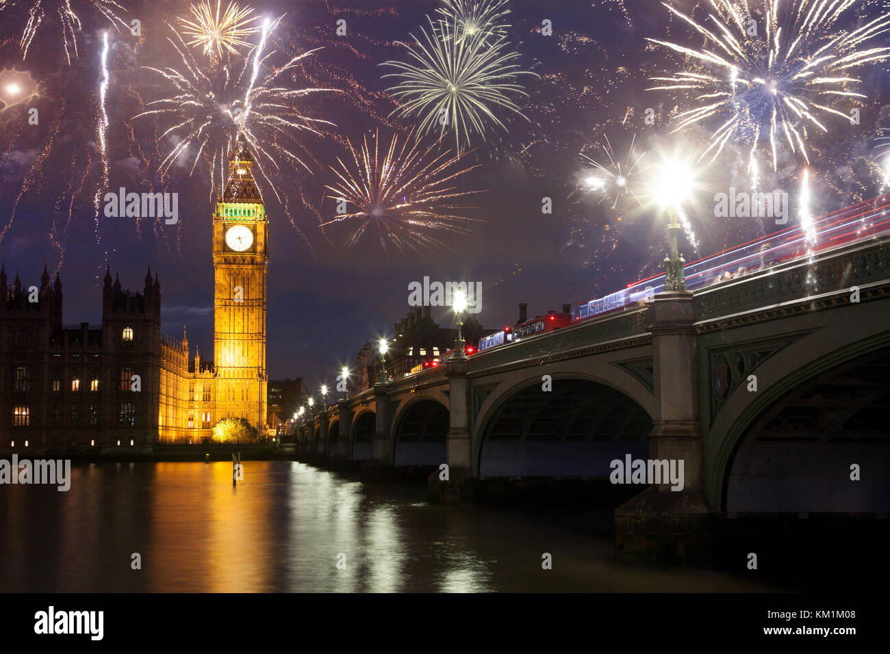 explosive fireworks display fills the sky around Big Ben. New Year's ...