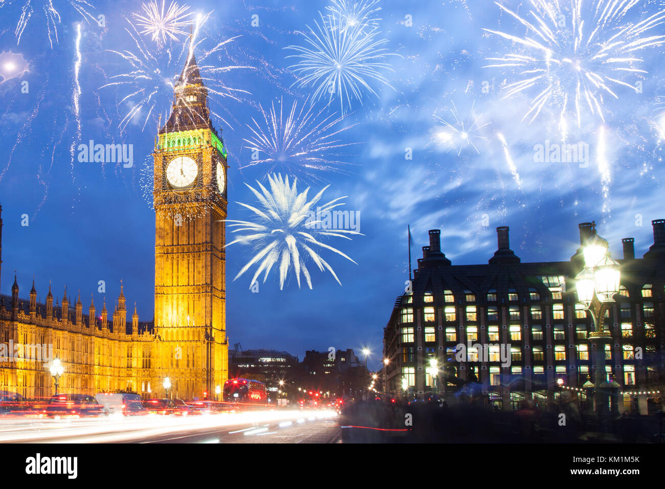 explosive fireworks display fills the sky around Big Ben. New Year's ...
