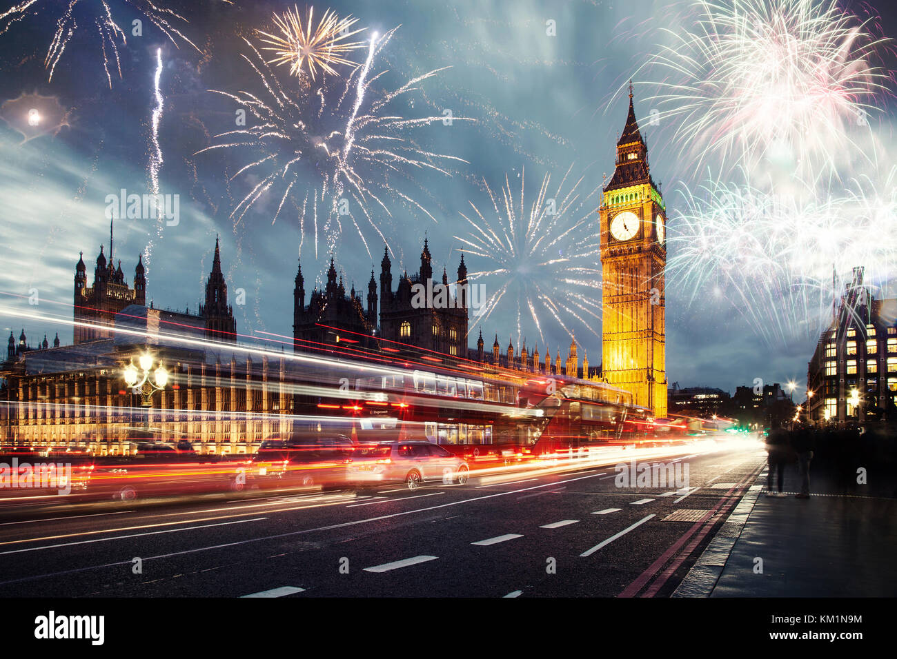 explosive fireworks display fills the sky around Big Ben. New Year's ...