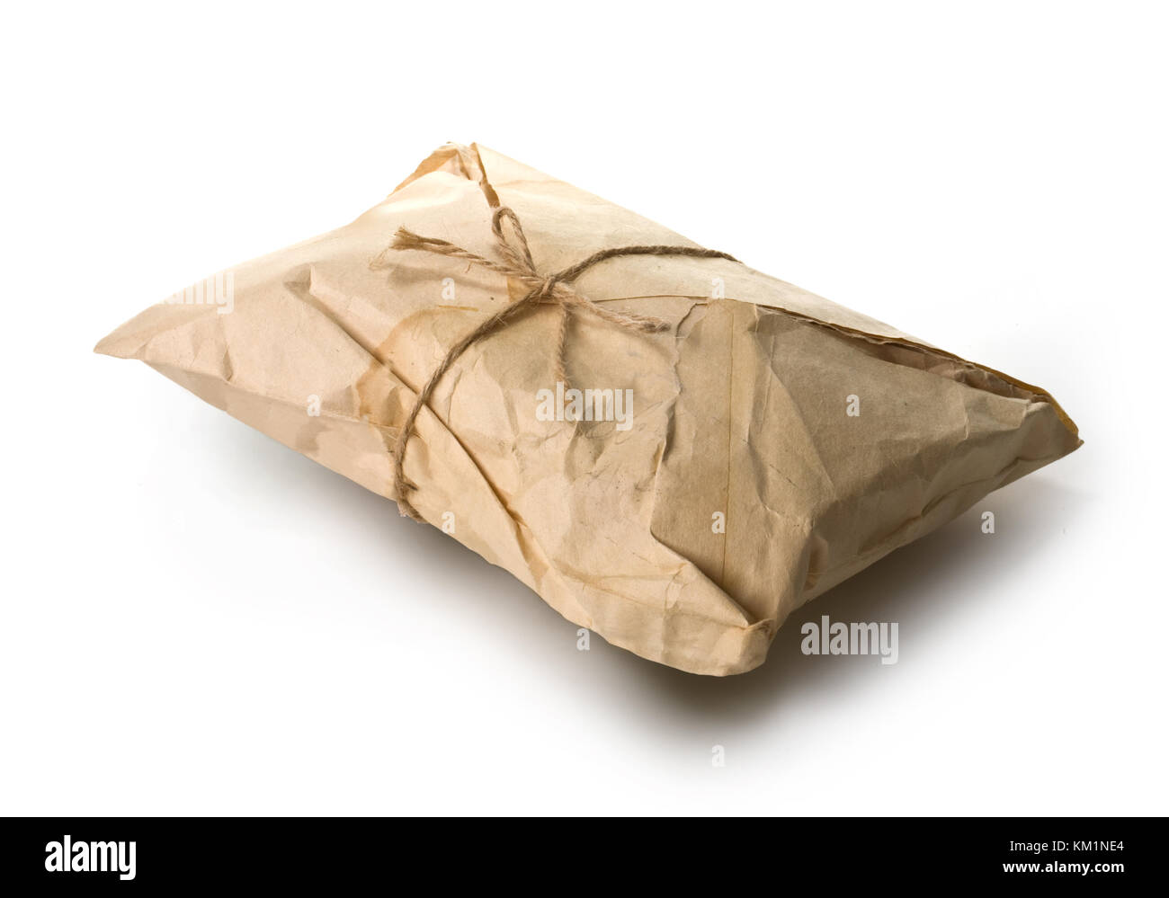 rumpled brown paper envelope tied with twine Stock Photo - Alamy
