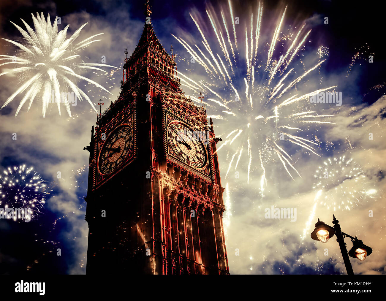 Explosive fireworks display fills the sky around Big Ben. New Year's ...