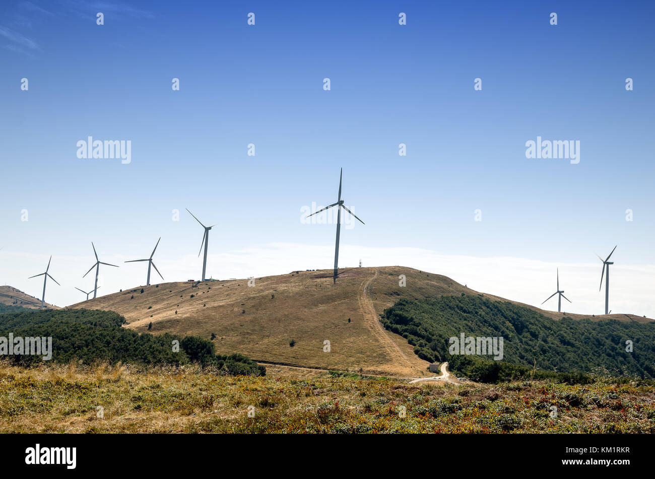 Windmill farm in mountain Stock Photo - Alamy