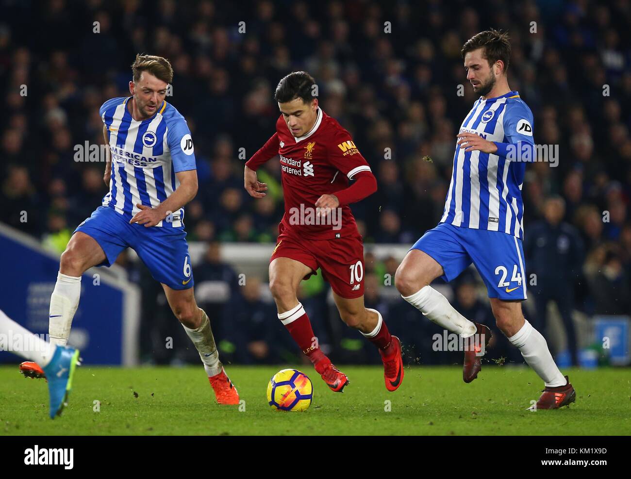 Philippe Coutinho of Liverpool weaves his way past Davy Propper and ...