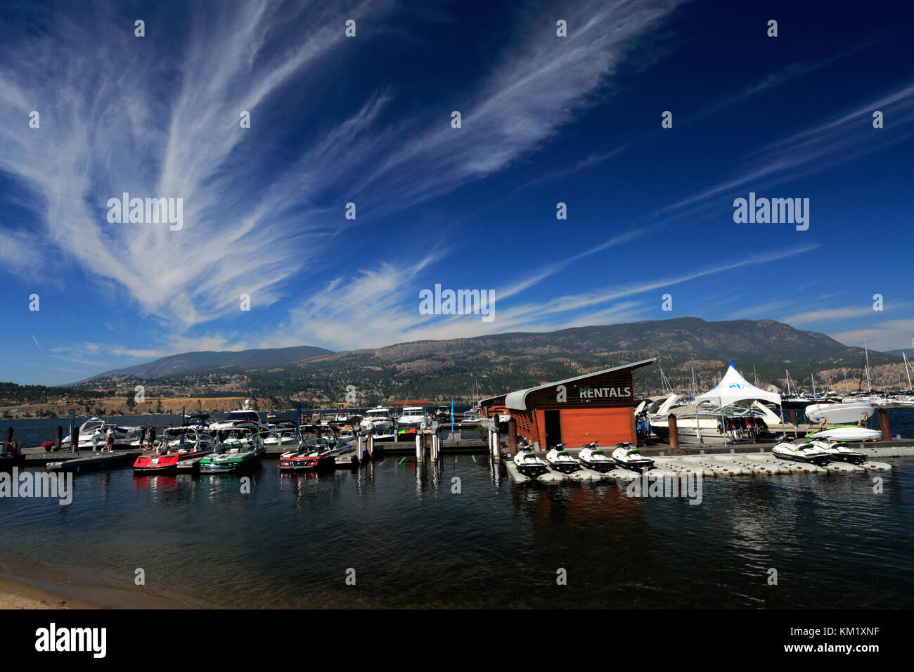 Summer, pleasure boats in the marina, Okanagan Lake, Kelowna town ...