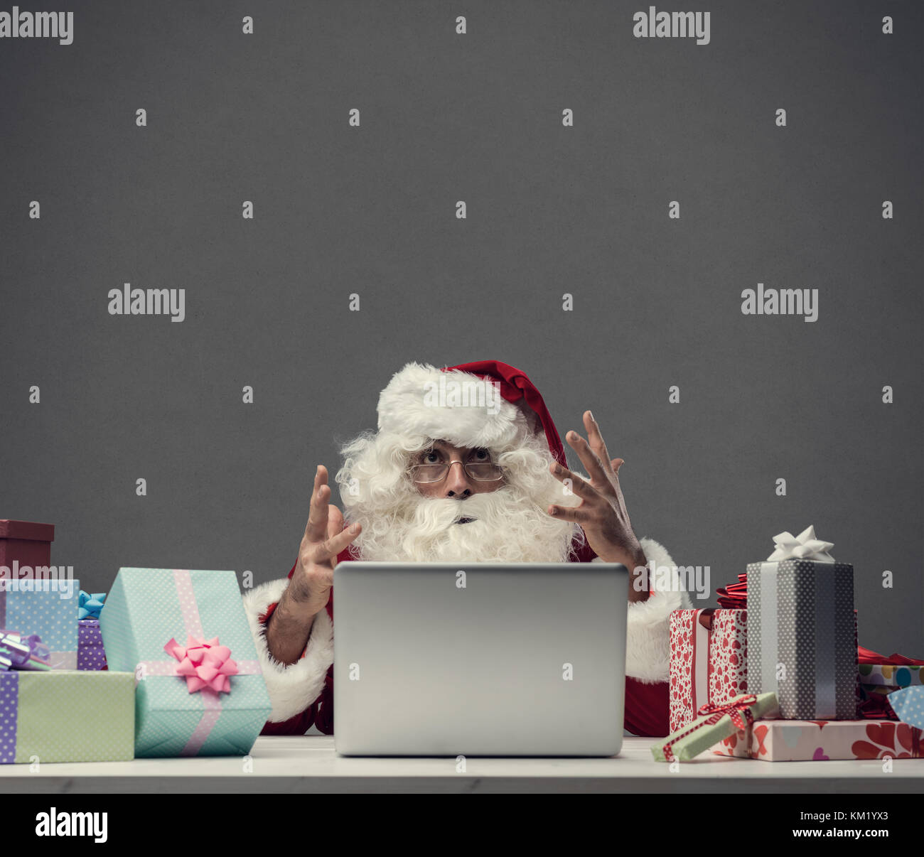 Angry frustrated Santa Claus yelling at the laptop on Christmas Eve ...