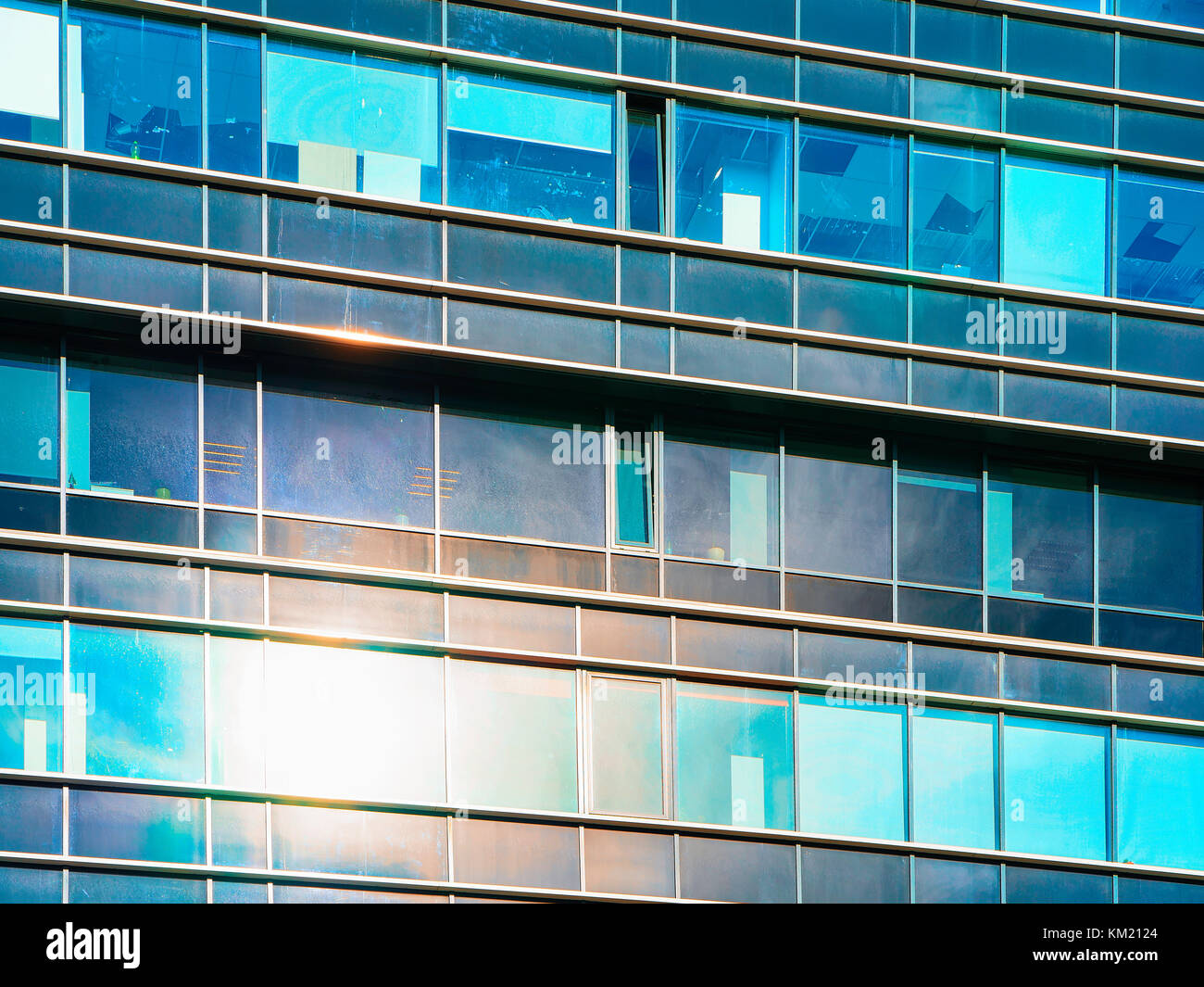 Glass windows of the modern office building skyscraper in the business ...