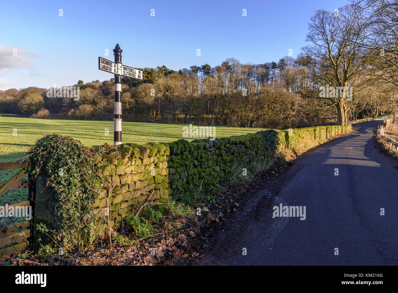 Country signpost. Lancashire. Drystone wall. country lane Stock Photo ...