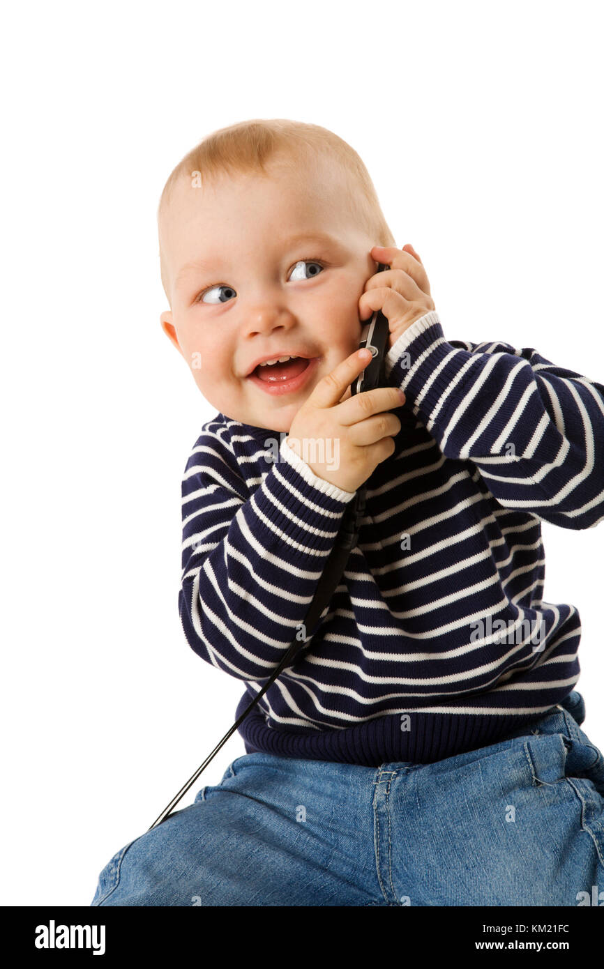 Happy little boy talking on phone isolated on white Stock Photo - Alamy