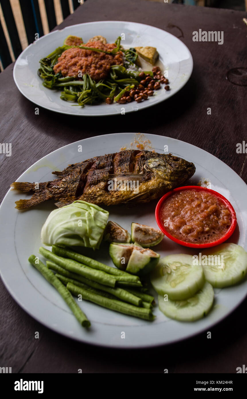 Indonesian food: Ikan goreng (fried fish) and kankung plecing (spicy ...