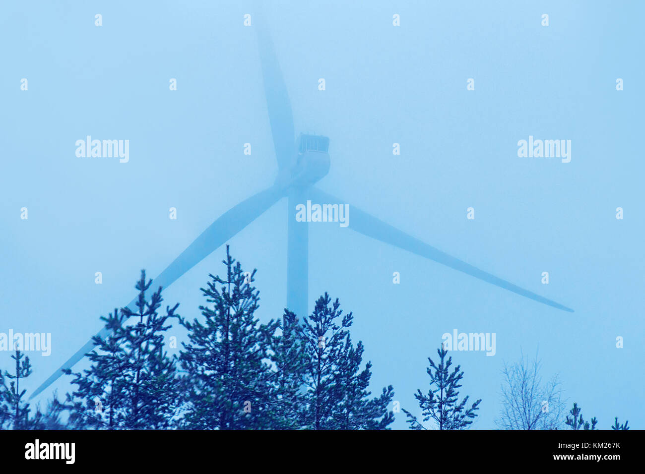 Wind mill in the mist in winter Rovaniemi, Lapland, Finland. At fog ...