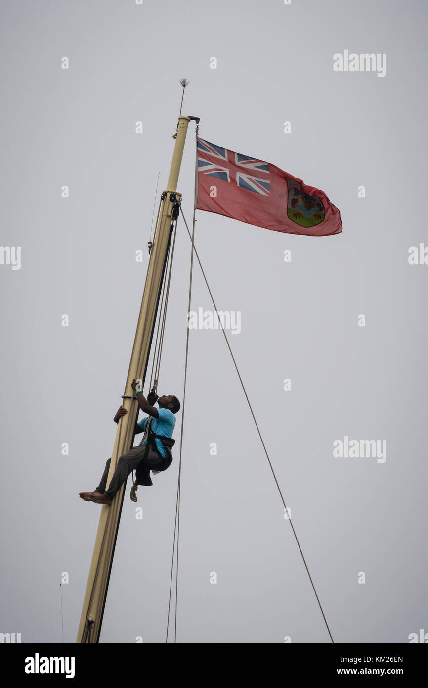 A man aloft on the mast of the "Spirit of Bermuda" tall ship Stock ...