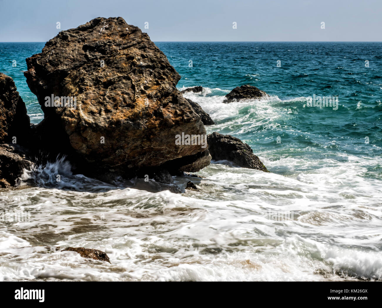 Waves hitting the rocks at Zuma Beach - Zuma Beach, Los Angeles, LA ...