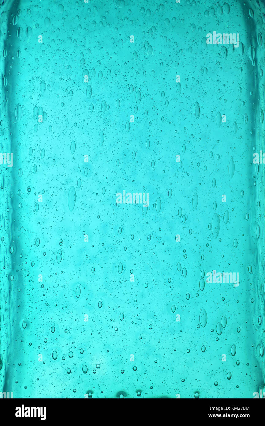 Background texture of solid transparent teal blue color glass with ...