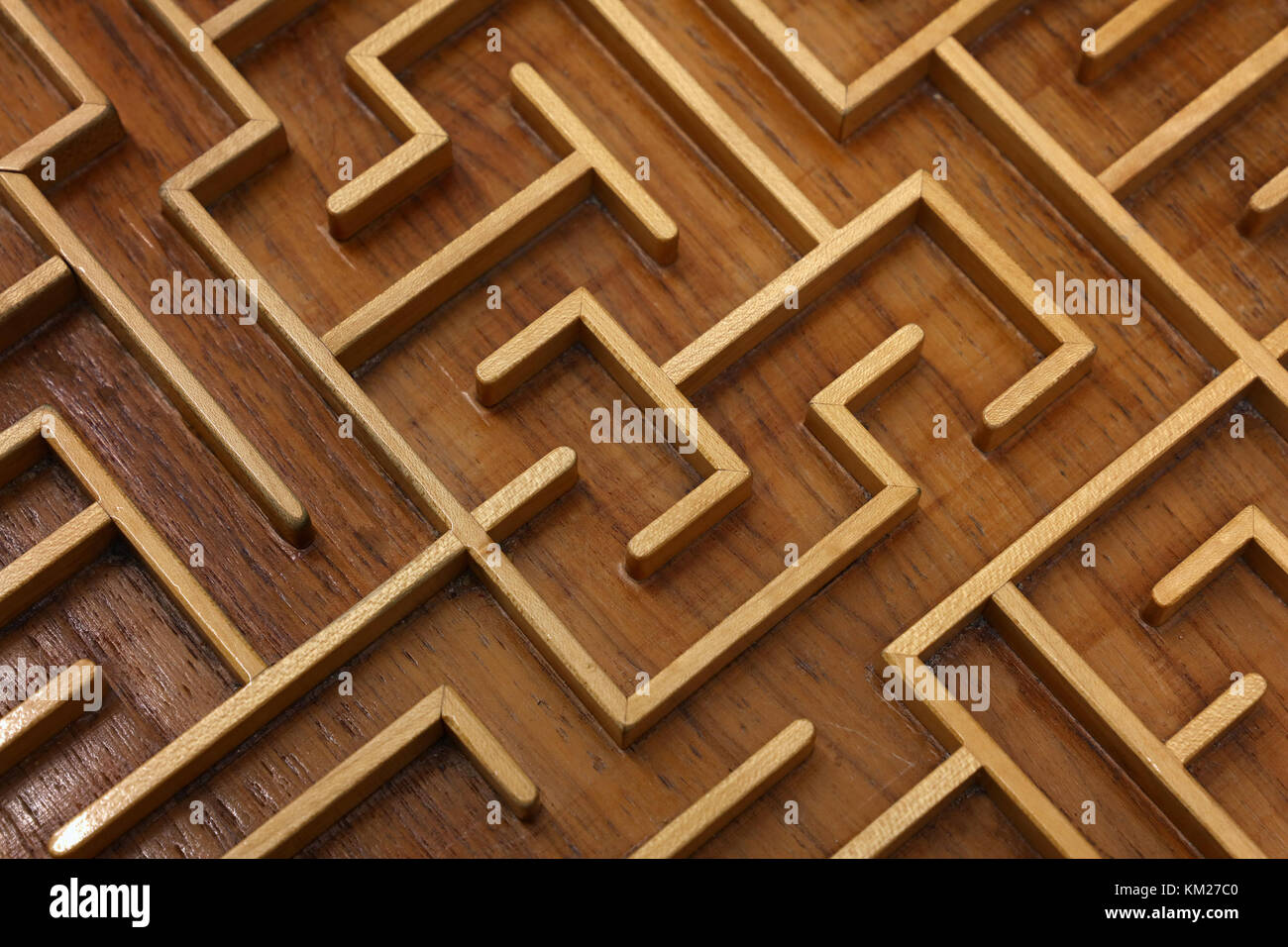 Close up of brown wooden labyrinth maze, toy puzzle game, elevated ...