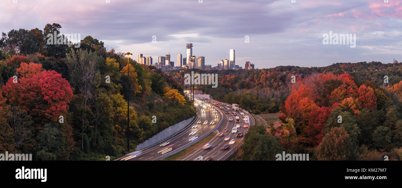 Cars heading towards downtown Toronto through the scenic Don Valley at ...