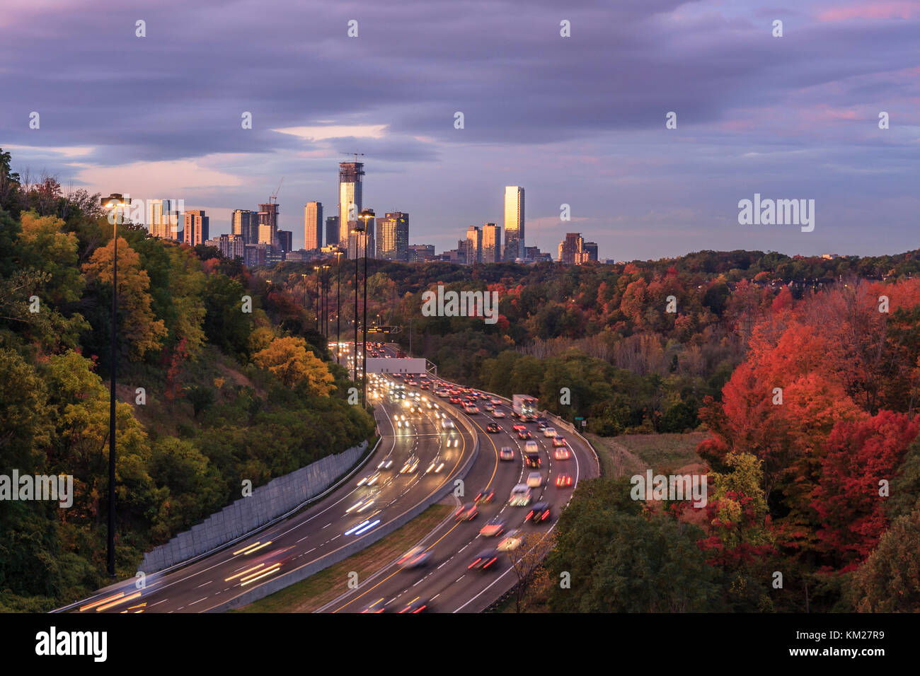 Cars heading towards downtown Toronto through the scenic Don Valley at ...