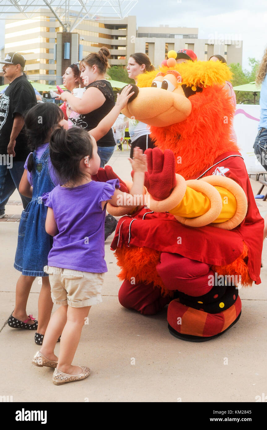 Orbit, the mascot for the Albuquerque isotopes with kids Stock Photo ...