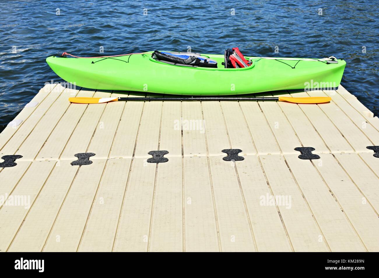 Kayak on wooden pier with blue sky background and no people Stock Photo ...