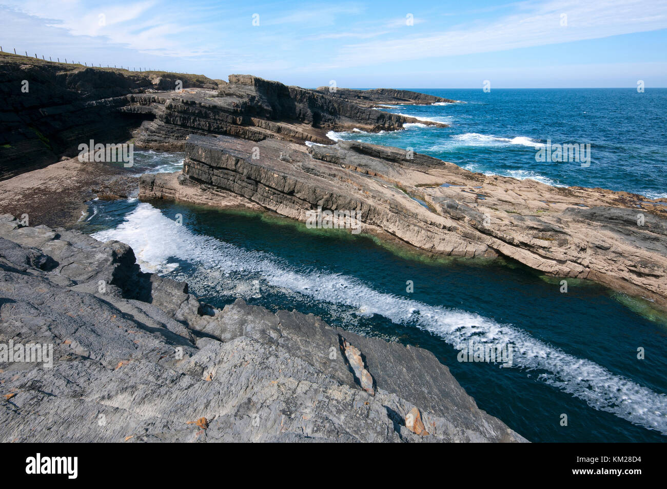 Jagged cliffs near Bridges of Ross, Loop Head peninsula, County Clare ...