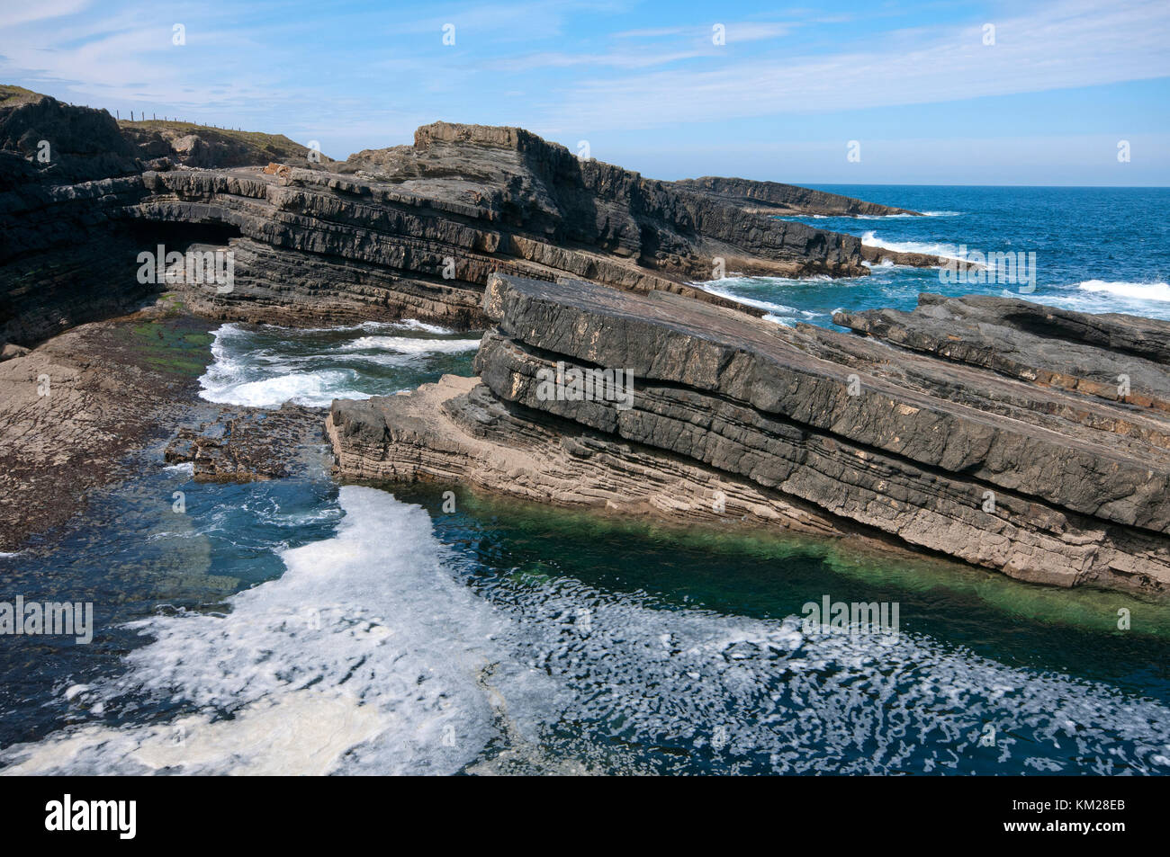 Jagged cliffs near Bridges of Ross, Loop Head peninsula, County Clare ...