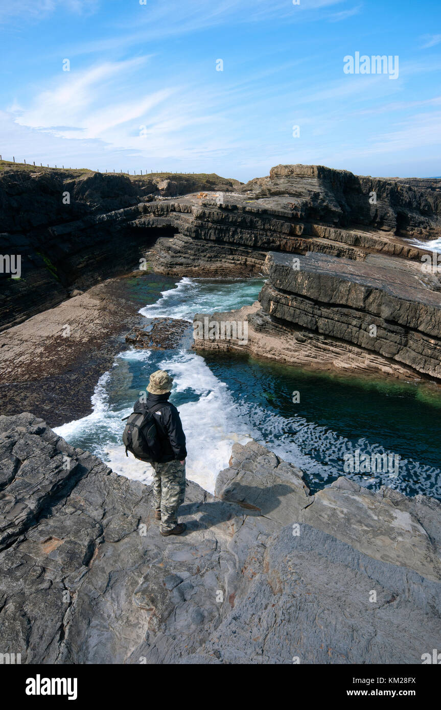 Jagged cliffs near Bridges of Ross, Loop Head peninsula, County Clare ...