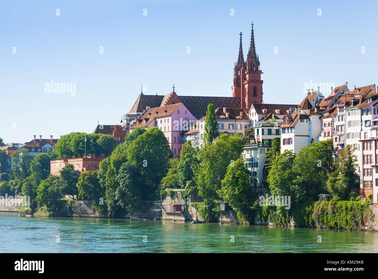 Scenic view of Rhine waterfront with Basel Minster in the background ...