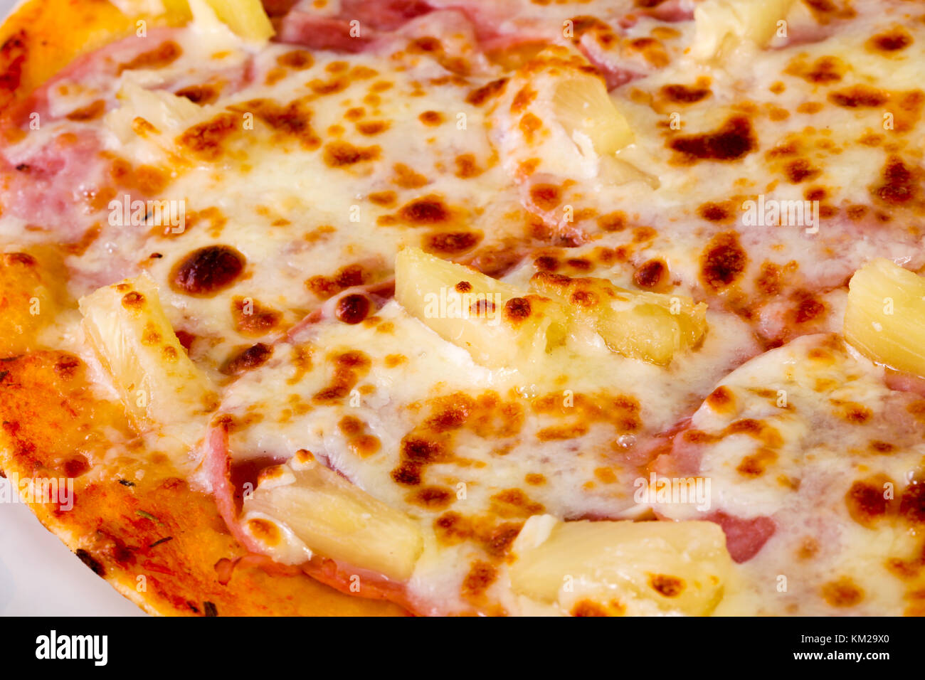 Pizza with ham and cheese Stock Photo - Alamy