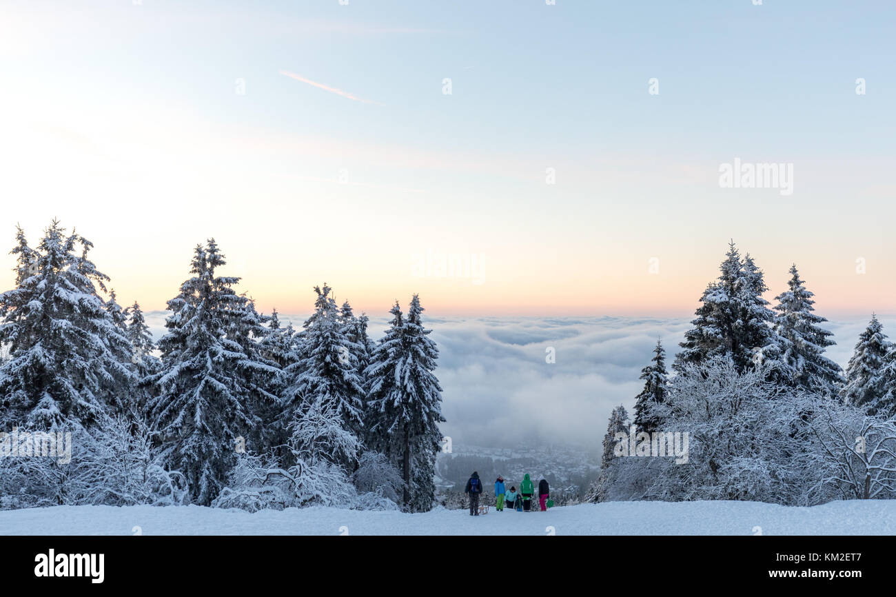 Schmitten, Germany. 02nd Dec, 2017. Strollers hike across the snowy ...